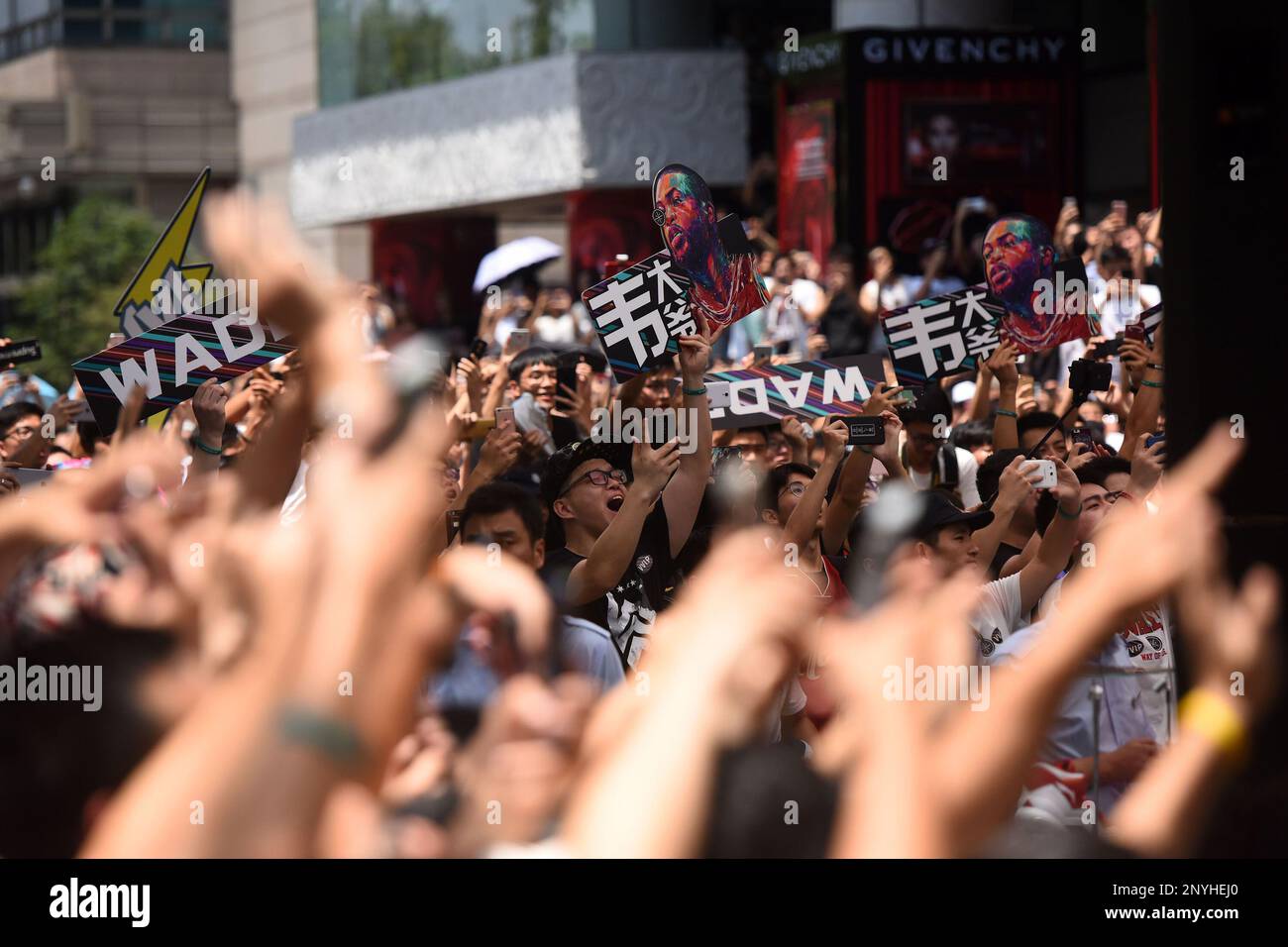 Chinese fans are pictured at a fan meeting event during NBA star Dwyane ...
