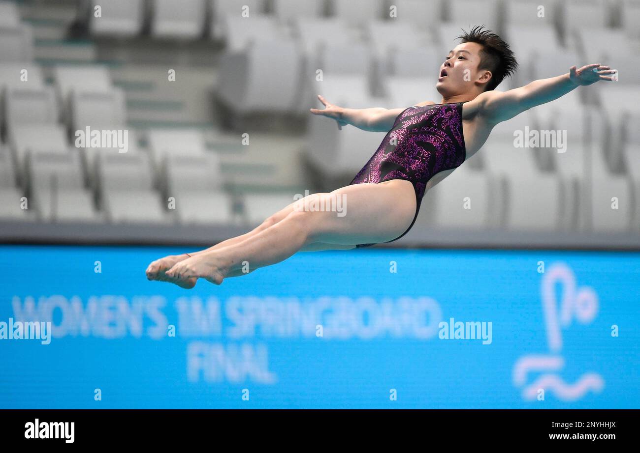 Yiwen Chen of China competes in the women's diving 1m springboard final ...