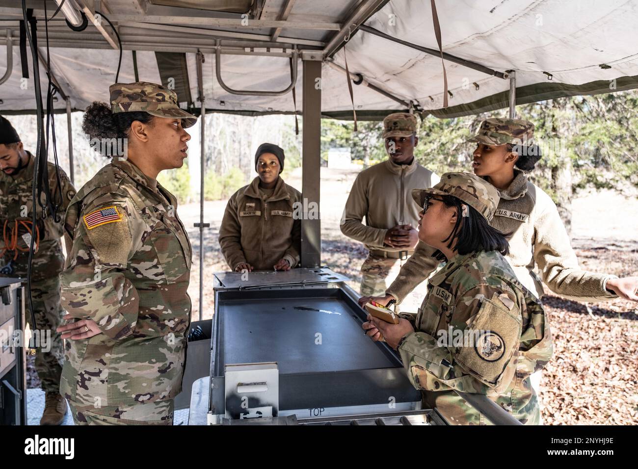 Members of the 375th Quartermaster Company (Field Feeding), HQ, 518th ...