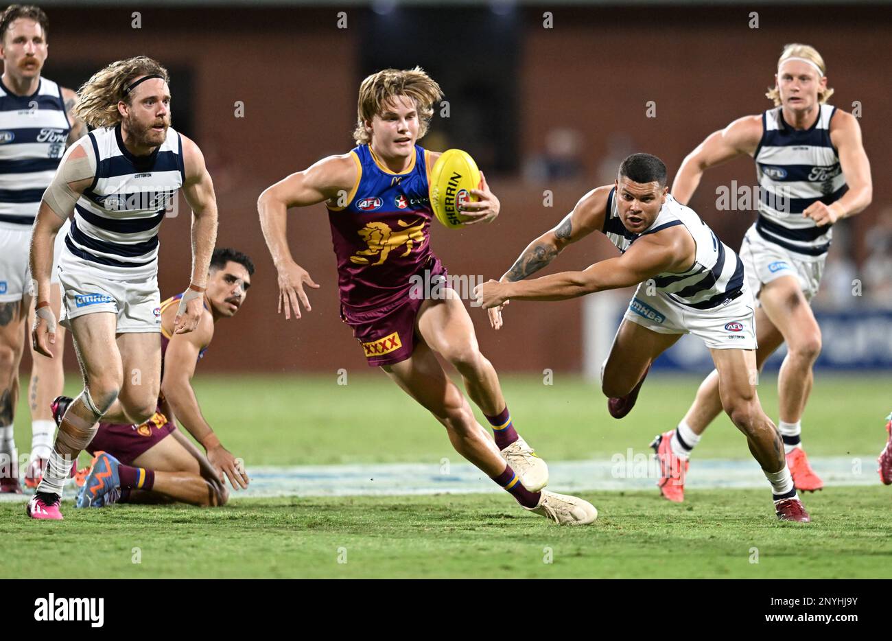 Will Ashcroft (centre) of the Lions in action during the AFL official ...