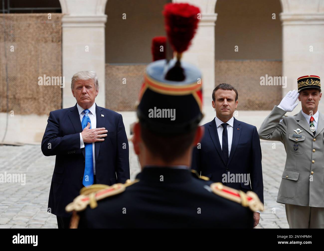 French President Emmanuel Macron and U.S. President Donald Trump, left ...