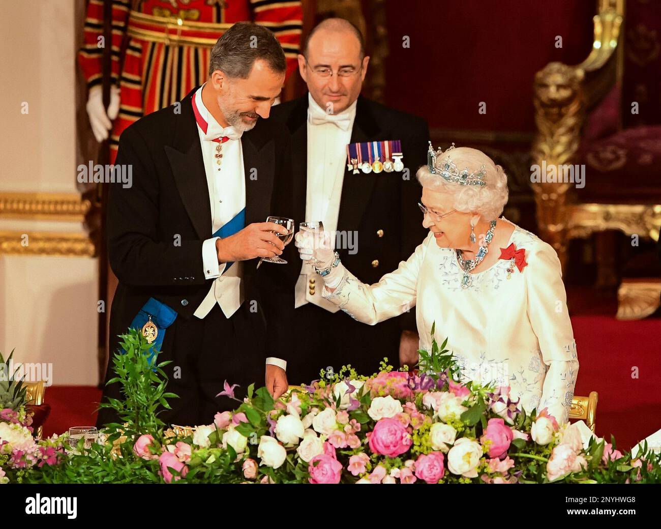 Britain's Queen Elizabeth II and King Felipe VI of Spain toast together during the State Banquet ...