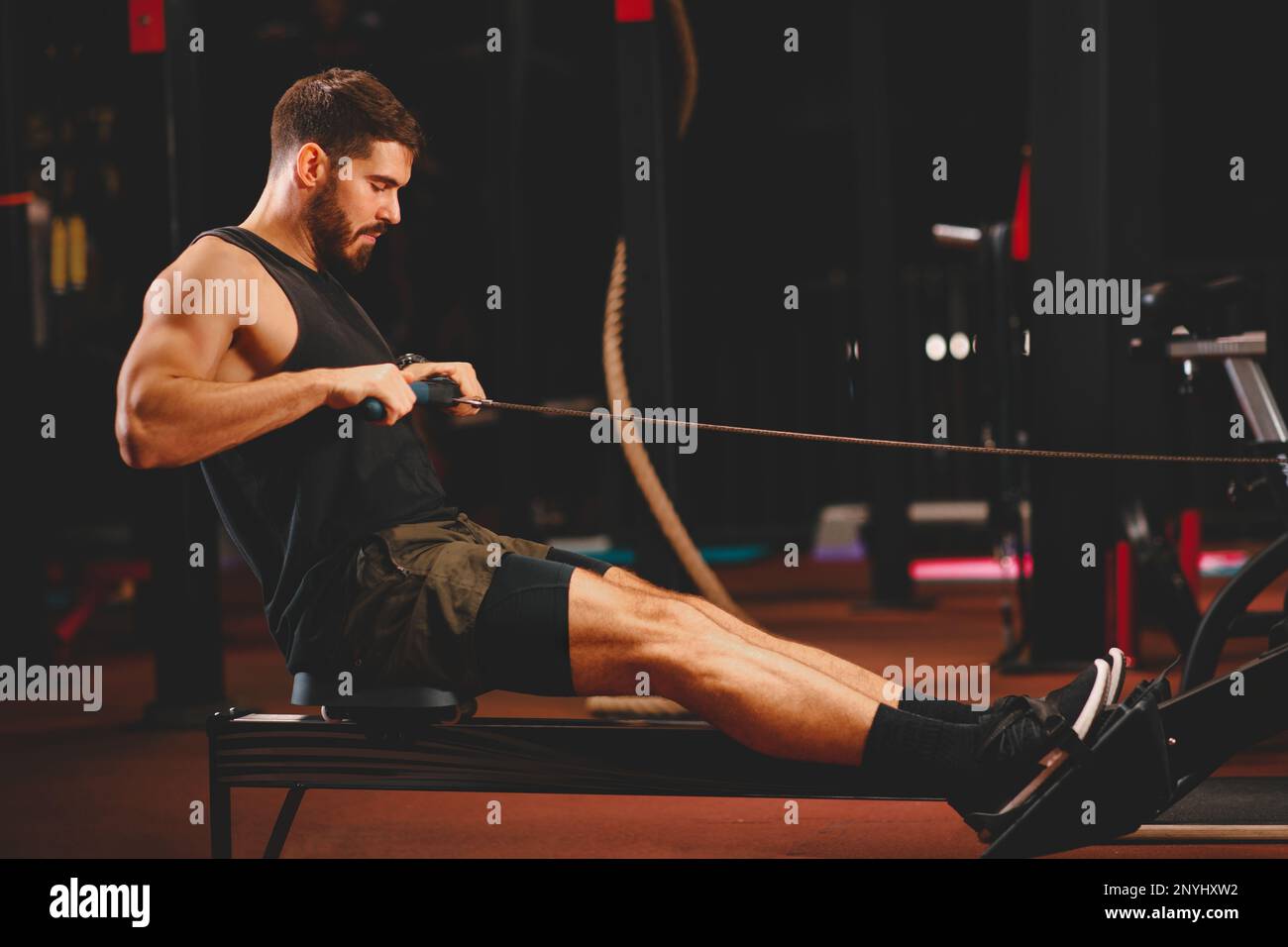 Man using exercise machine hi-res stock photography and images - Alamy