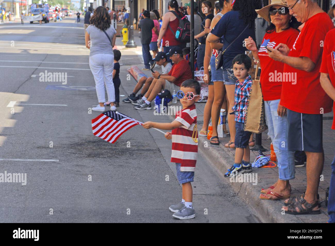 A boy waits for the annual Fourth of July Parade to commence Tuesday ...
