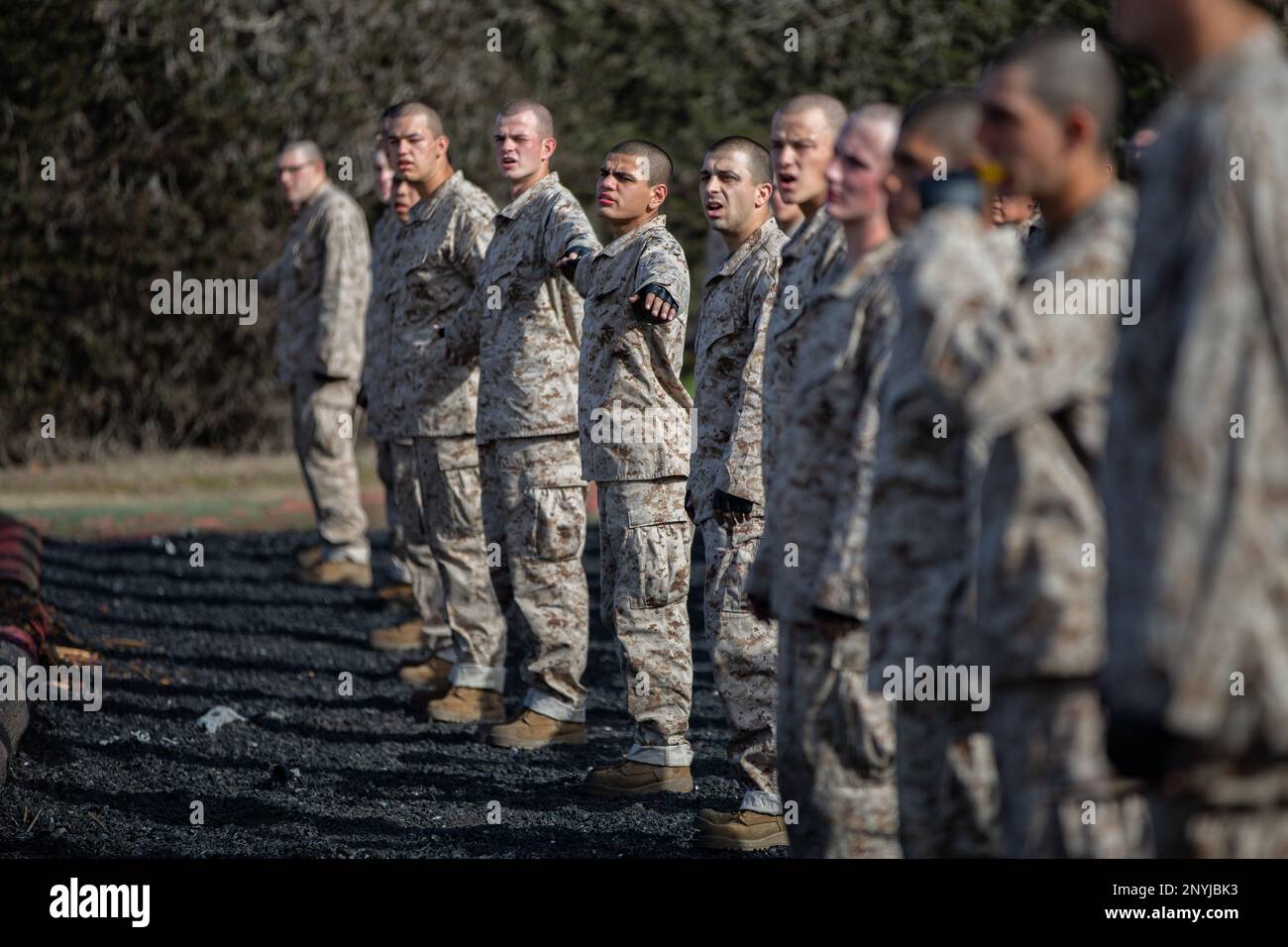 U.S. Marine Corps recruits with Kilo Company, 3rd Recruit Training Battalion, spread out during ...