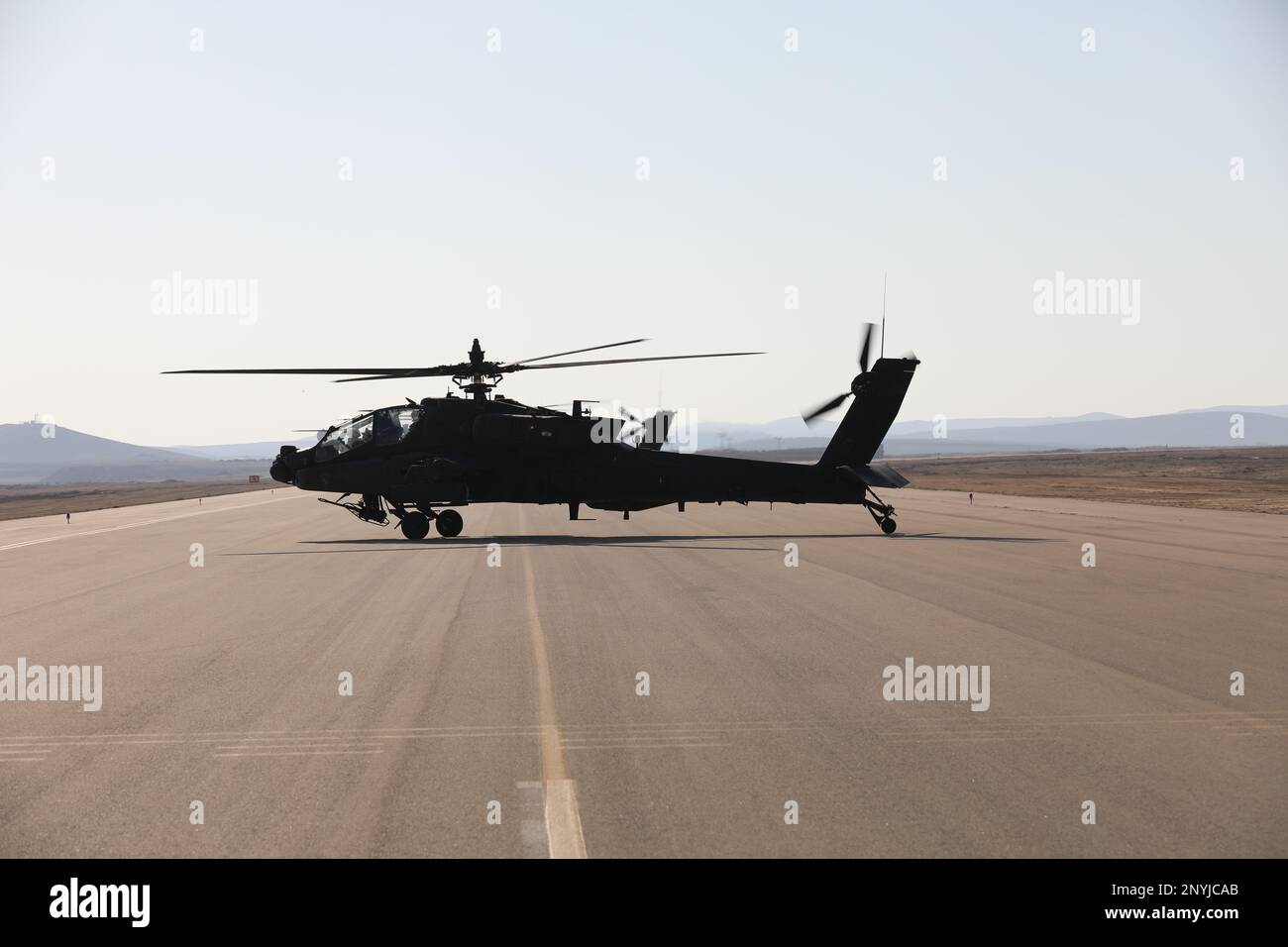 An AH-64 Apache helicopter, from the 36th Combat Aviation Brigade, gets ...