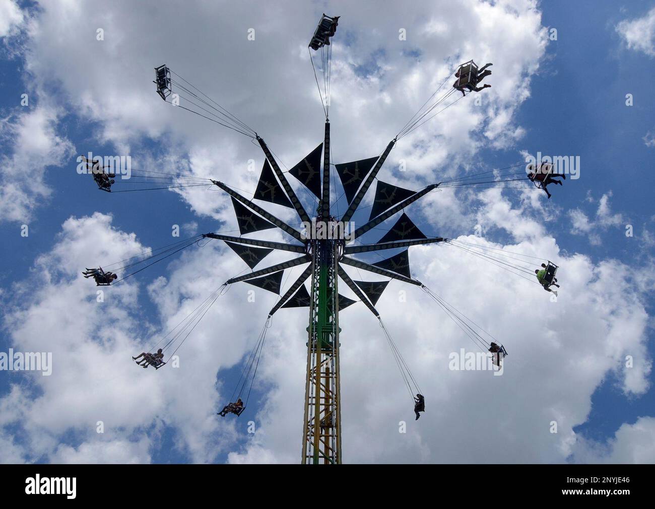 Riders spin around the Zugvogel ride on Saturday, July 8, 2017, at the ...