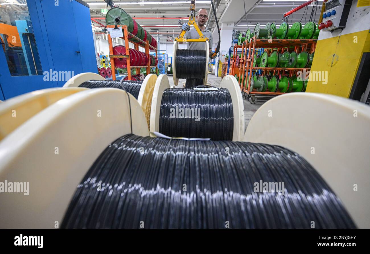 Stuttgart, Germany. 02nd Mar, 2023. An employee of cable manufacturer ...