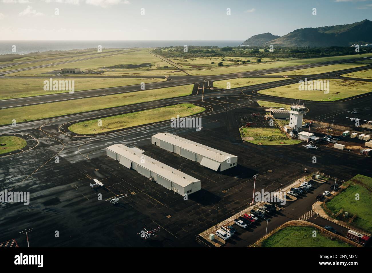 Aerial view of the runway and plane hangars of Lihue airport on Kauai ...