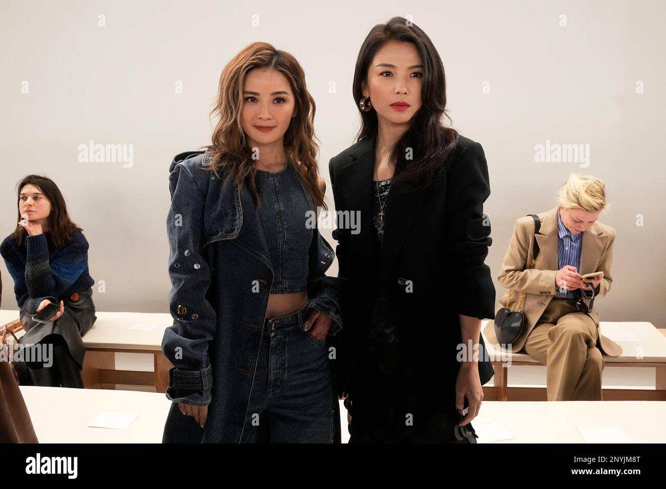 Charlene Choi, left, and Liu Tao attend8 the Chloe Fall/Winter 2023 ...