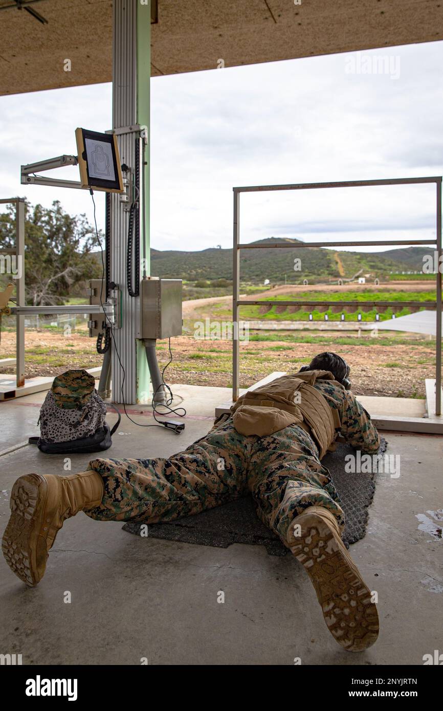 U.S. Marine Corps Lance Cpl. Gabriel Oreaiglesias fires an M-16A4 ...