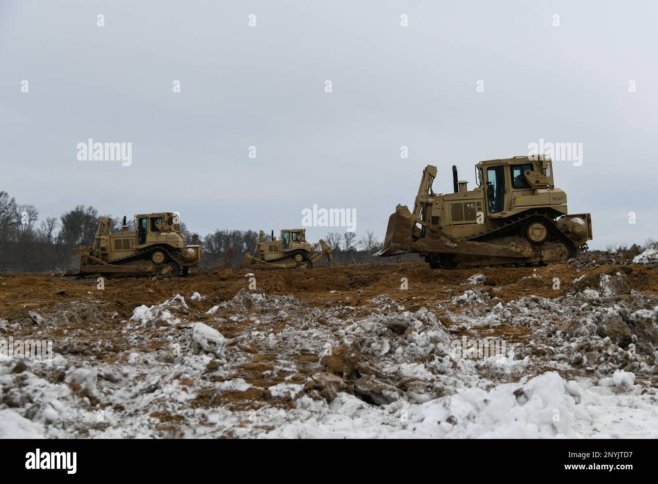 Soldiers from the 1432nd Engineer Company, Michigan National Guard use ...