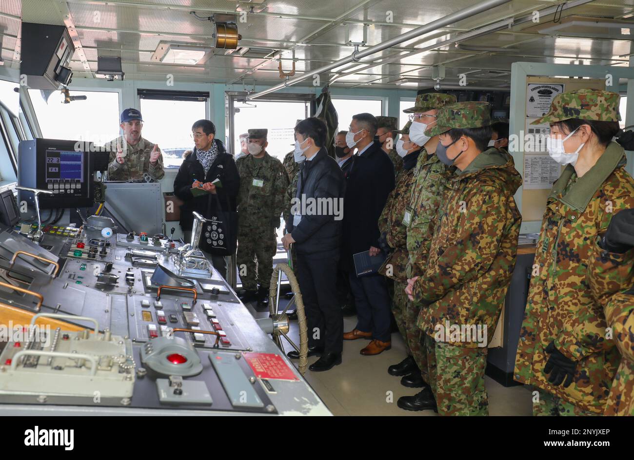 Chief Warrant Officer 2 Jason McElrath, left, vessel master of LCU ...