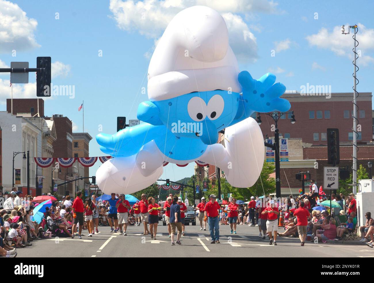 A Smurf balloon wows the crowd during the annual Fourth of July Parade ...