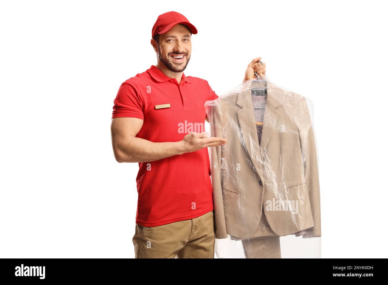 Male worker showing a suit from dry cleaners isolated on a white ...