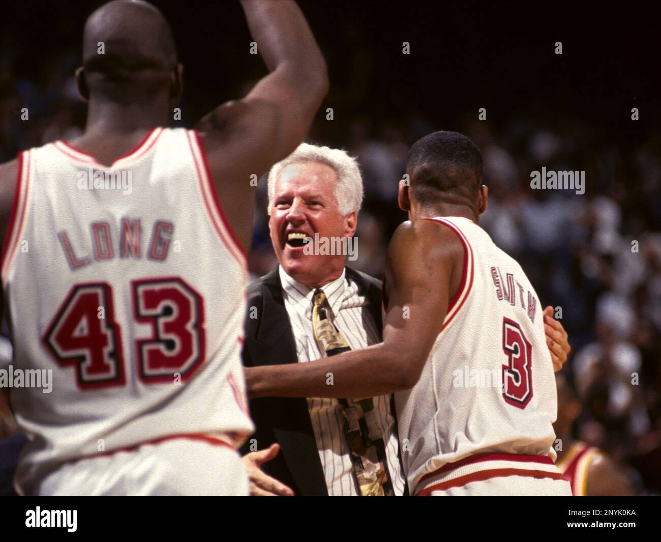 Miami Heat coach Kevin Loughery celebrates with forward Grant Long (43 ...