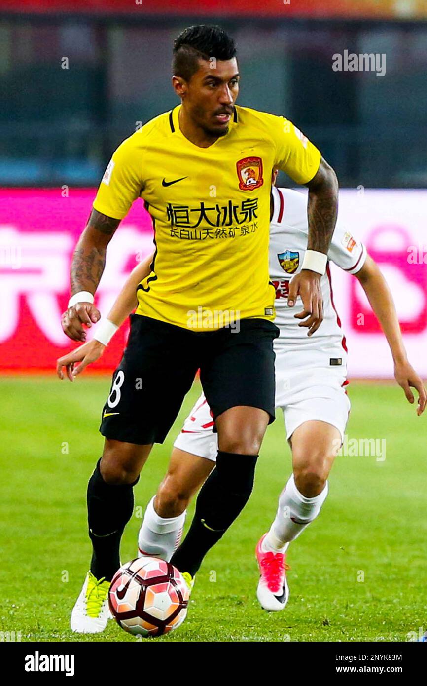 Brazilian football player Paulinho, front, of Guangzhou Evergrande ...