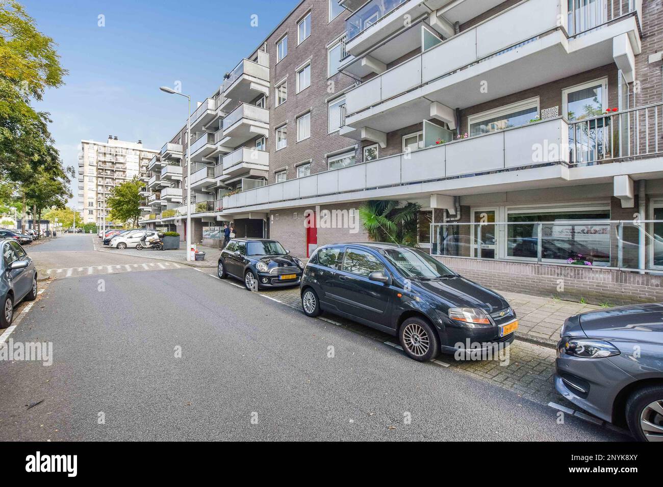 Amsterdam, Netherlands - 10 April, 2021: some cars parked on the side ...