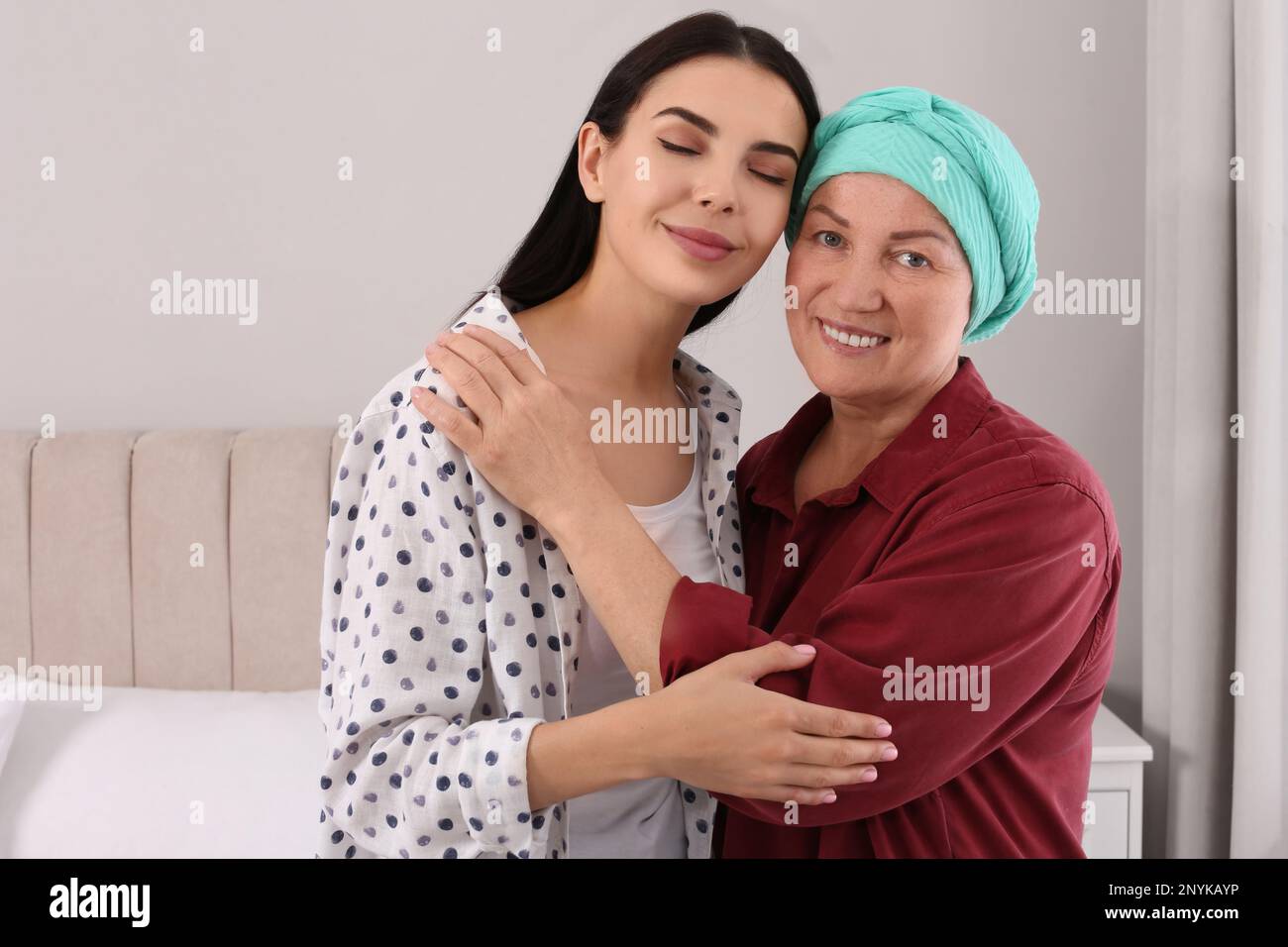Young woman visiting her mother with cancer indoors Stock Photo - Alamy