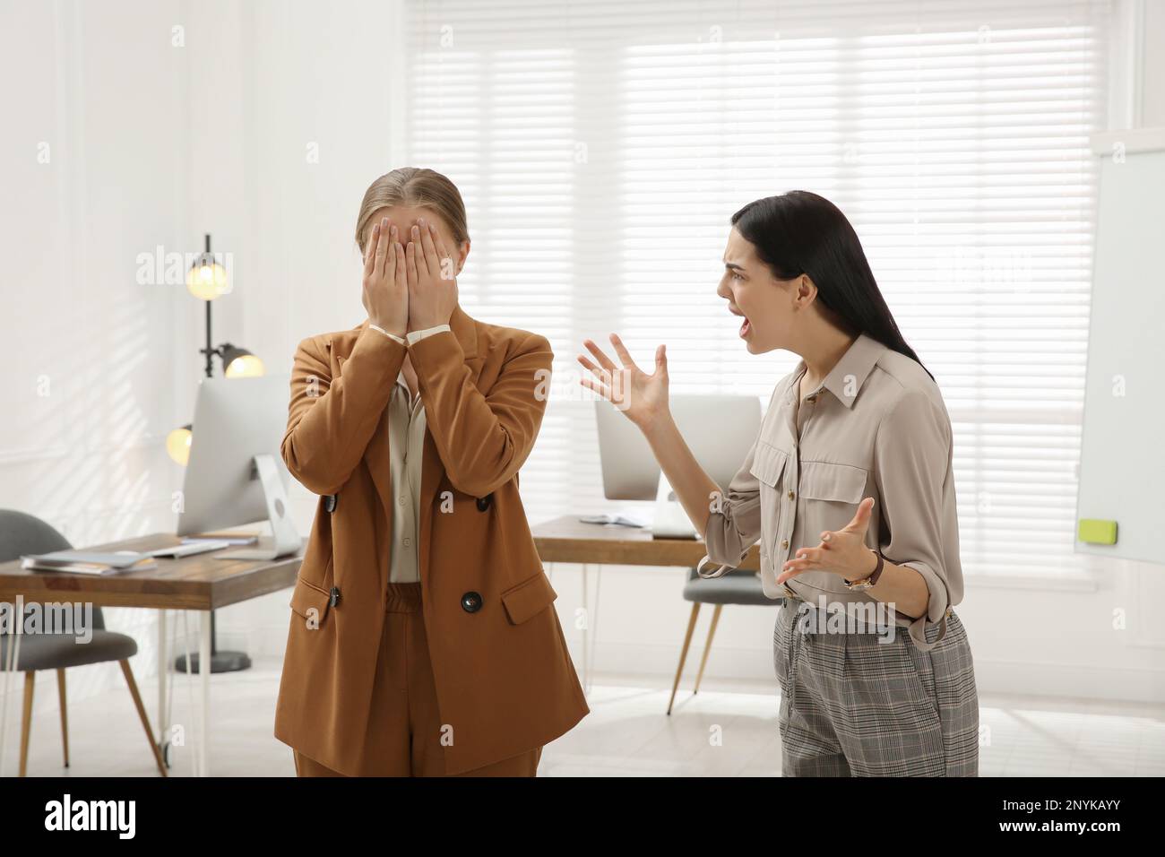 Boss screaming at employee in office. Toxic work environment Stock ...