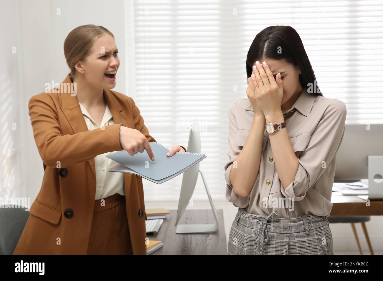 Boss screaming at employee in office. Toxic work environment Stock ...