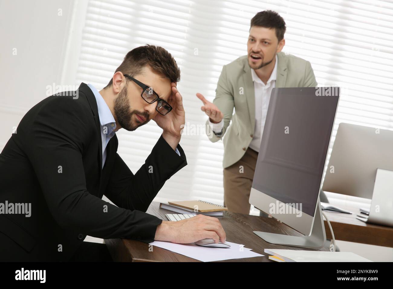 Boss screaming at employee in office. Toxic work environment Stock ...