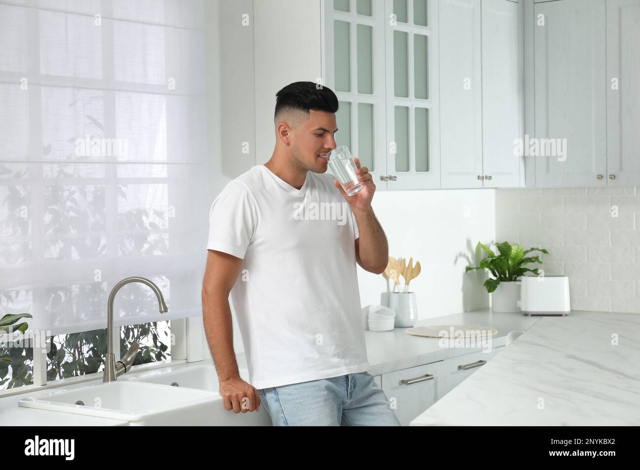 Drinking from faucet hi-res stock photography and images - Alamy