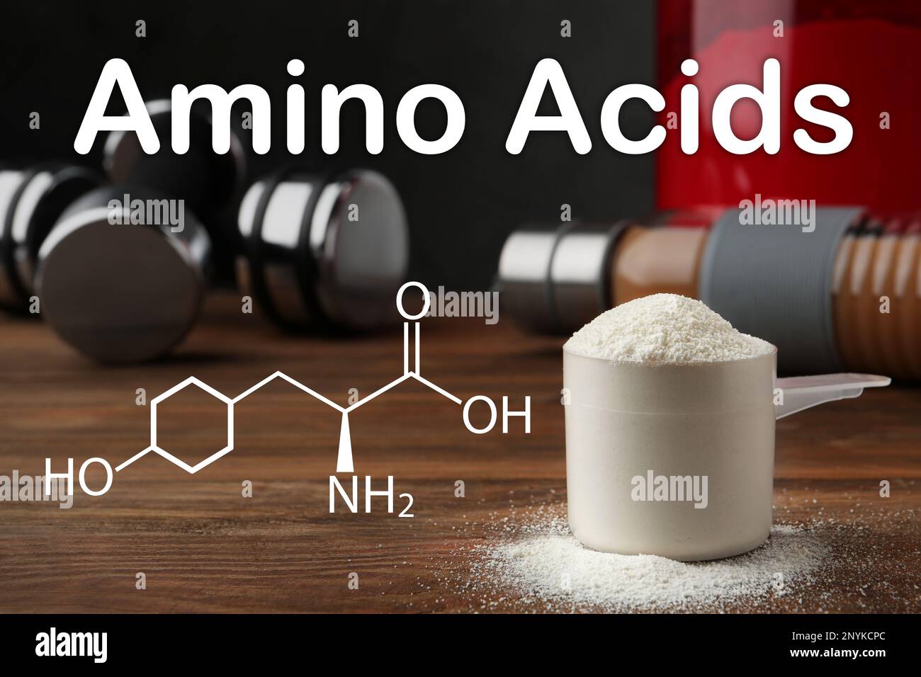 Measuring scoop of amino acids powder on wooden table Stock Photo - Alamy