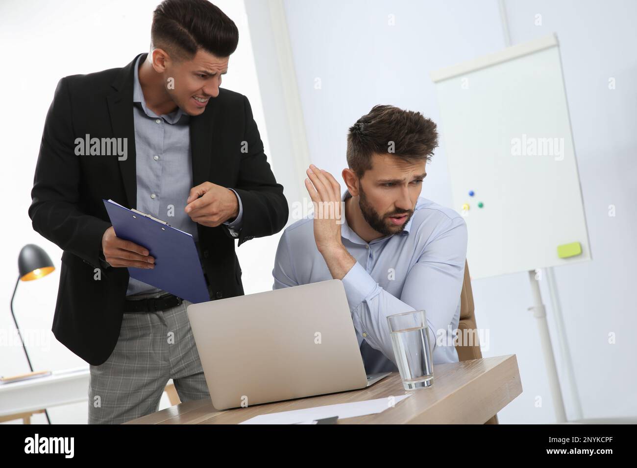 Boss screaming at employee in office. Toxic work environment Stock ...
