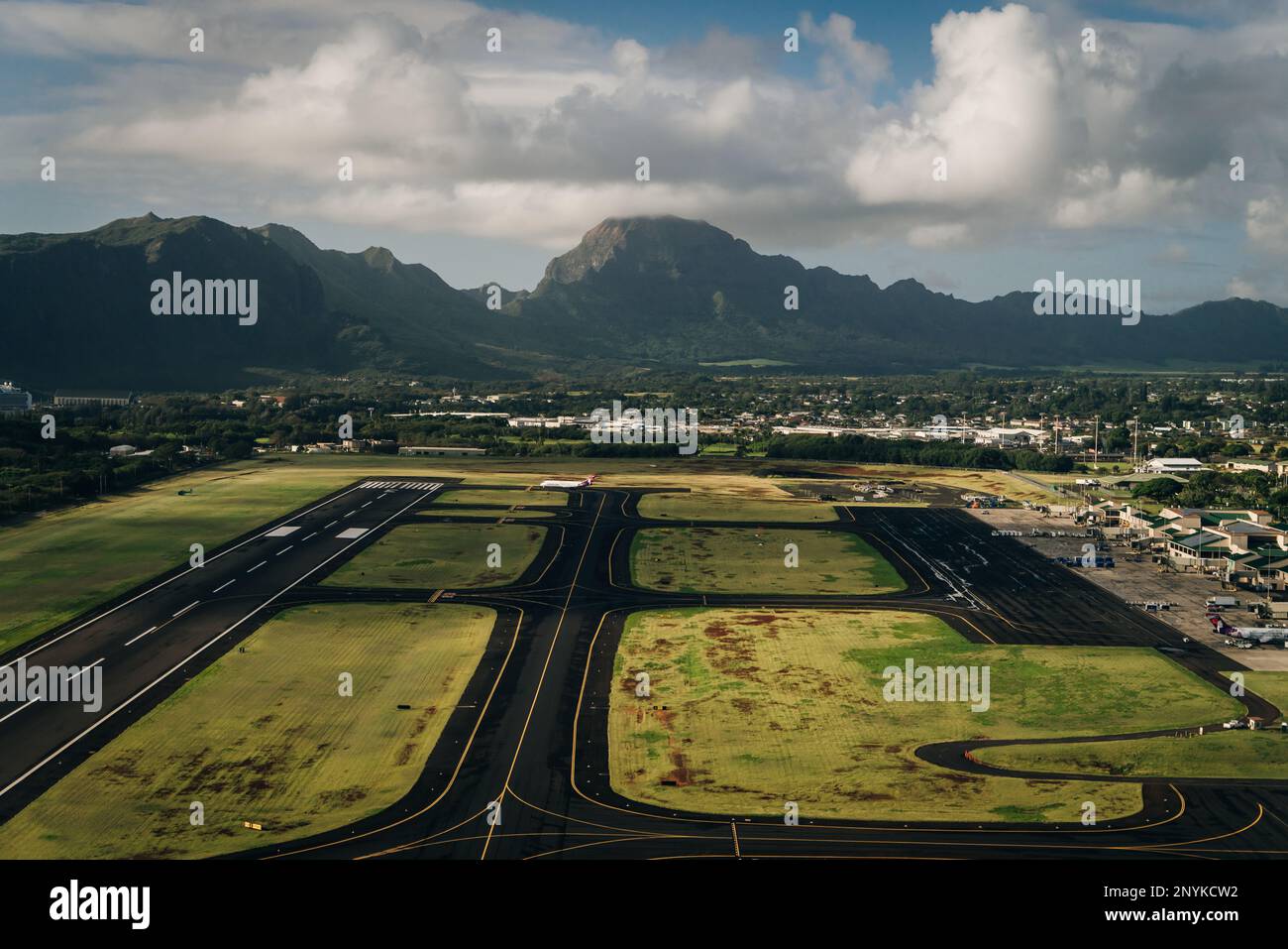 Aerial view of the runway and plane hangars of Lihue airport on Kauai ...