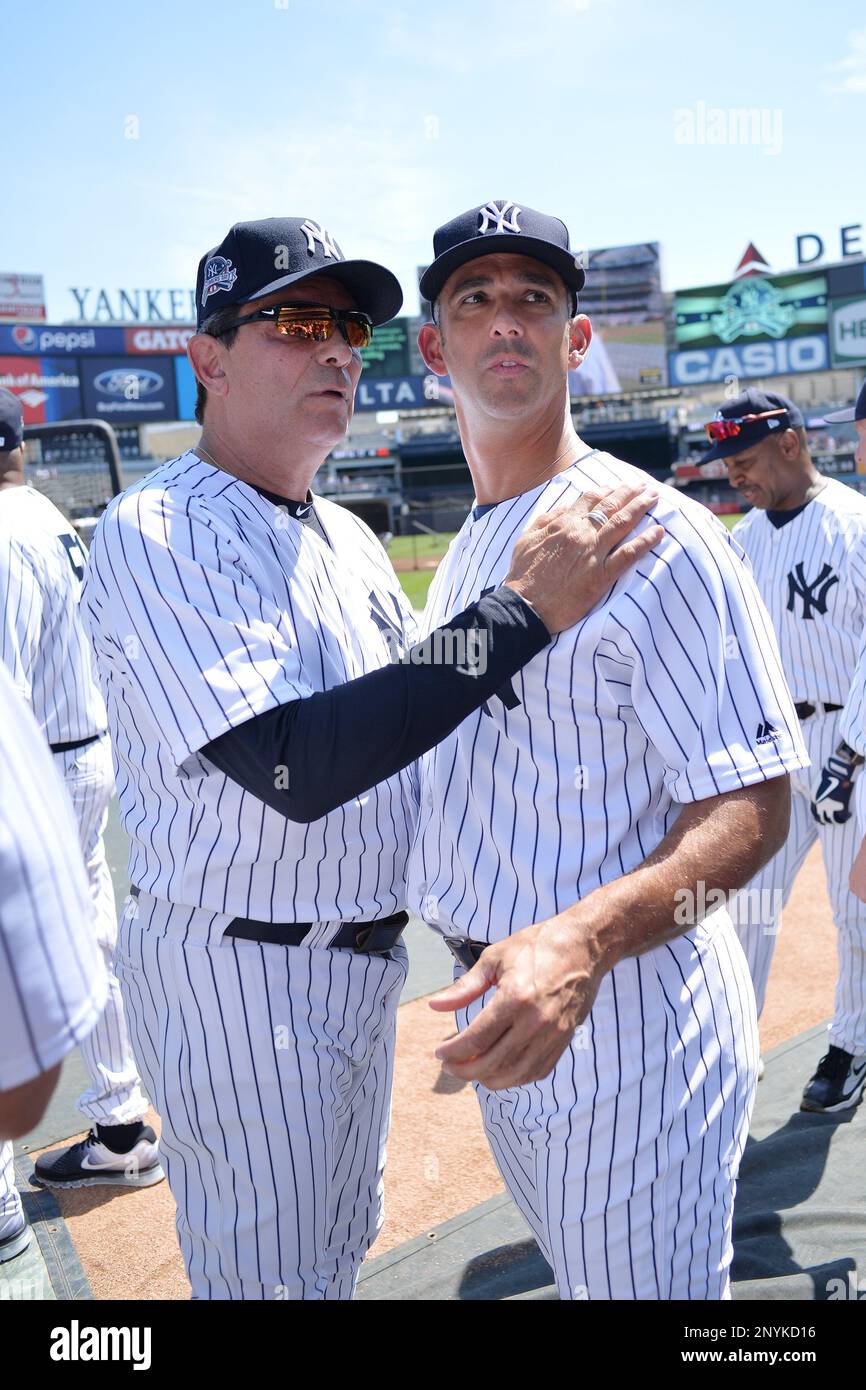 Former New York Yankees infielder Lee Mazzilli (24) and catcher Jorge ...