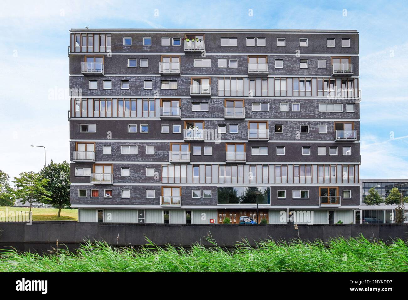 Amsterdam, Netherlands - 10 April, 2021: a very tall building with lots ...