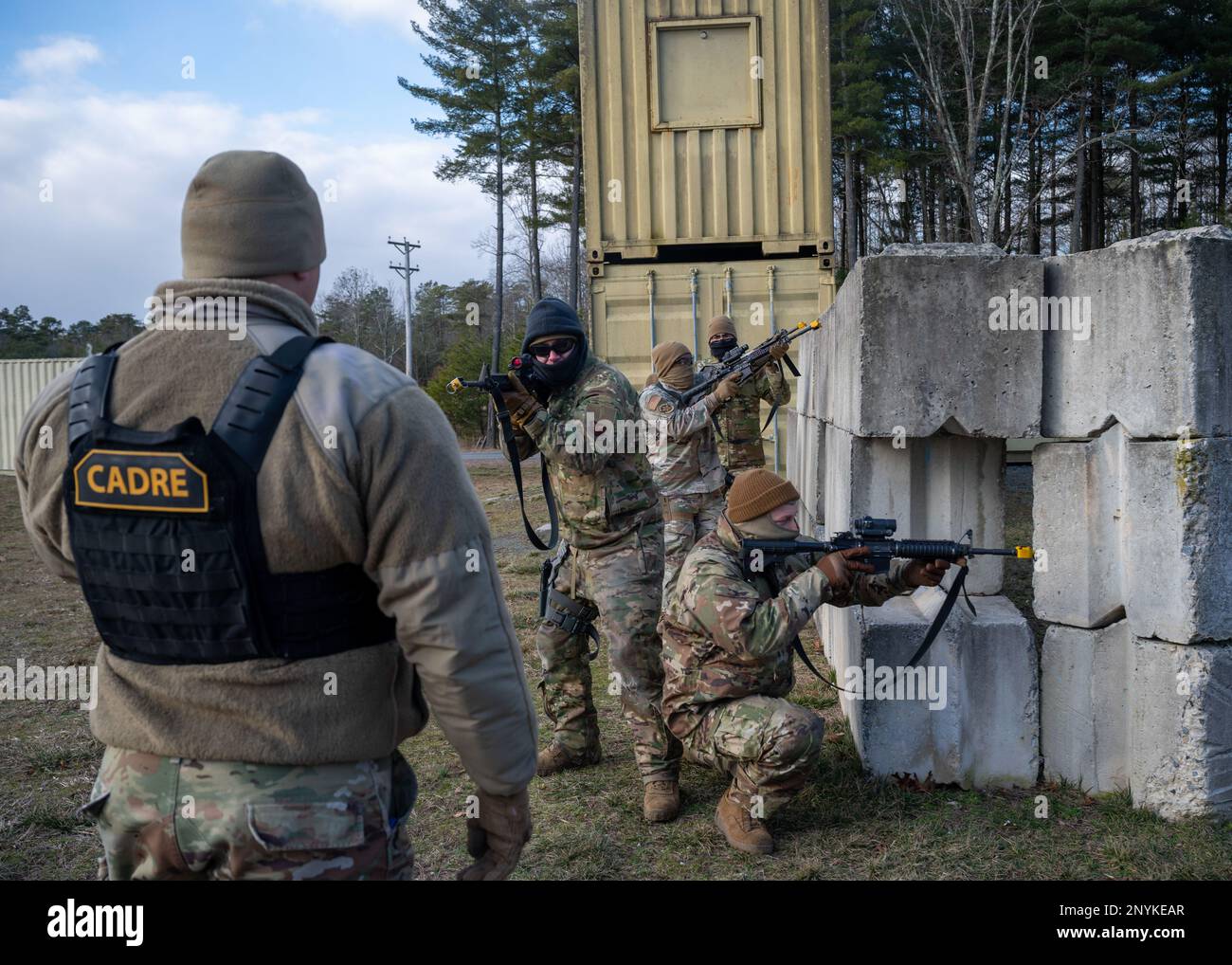 A U.S. Air Force Outside the Wire student fire team learns and executes ...