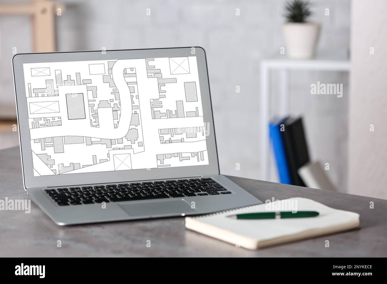 Modern laptop with cadastral map on screen in office Stock Photo - Alamy