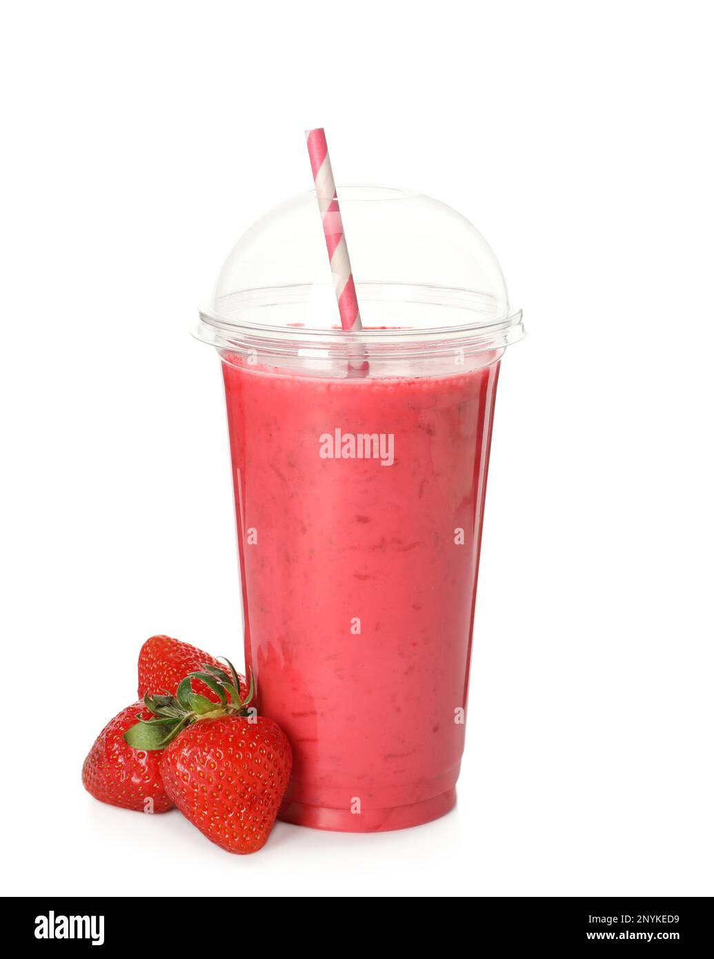 Delicious smoothie with straw in plastic cup and fresh strawberries on ...