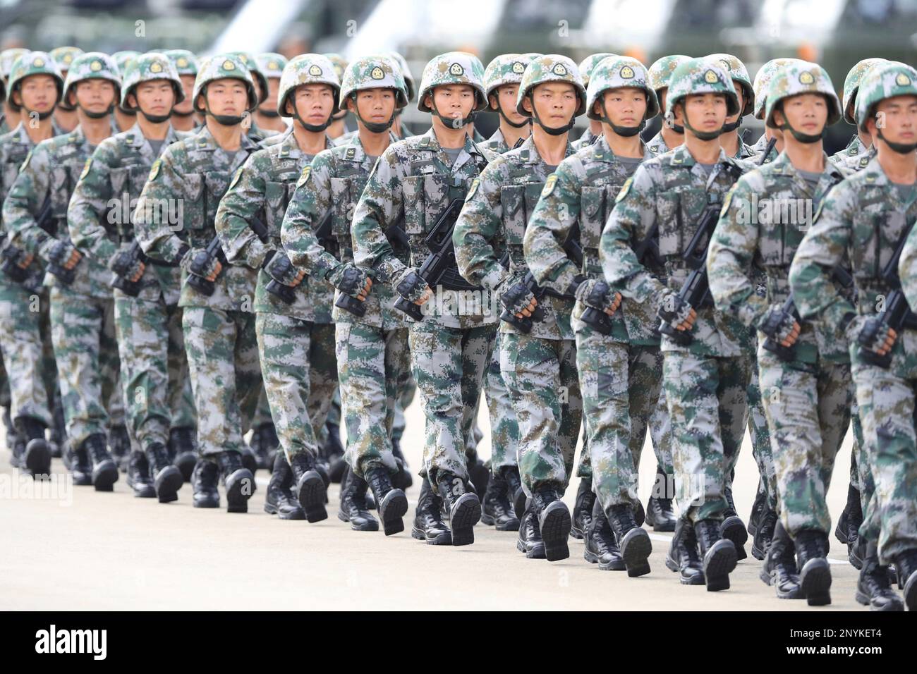 This photo shows Chinese troops of People's Liberation Army (PLA) Hong ...