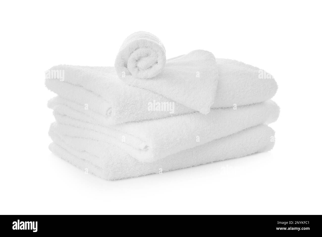 Stack of fresh clean towels on white background Stock Photo - Alamy