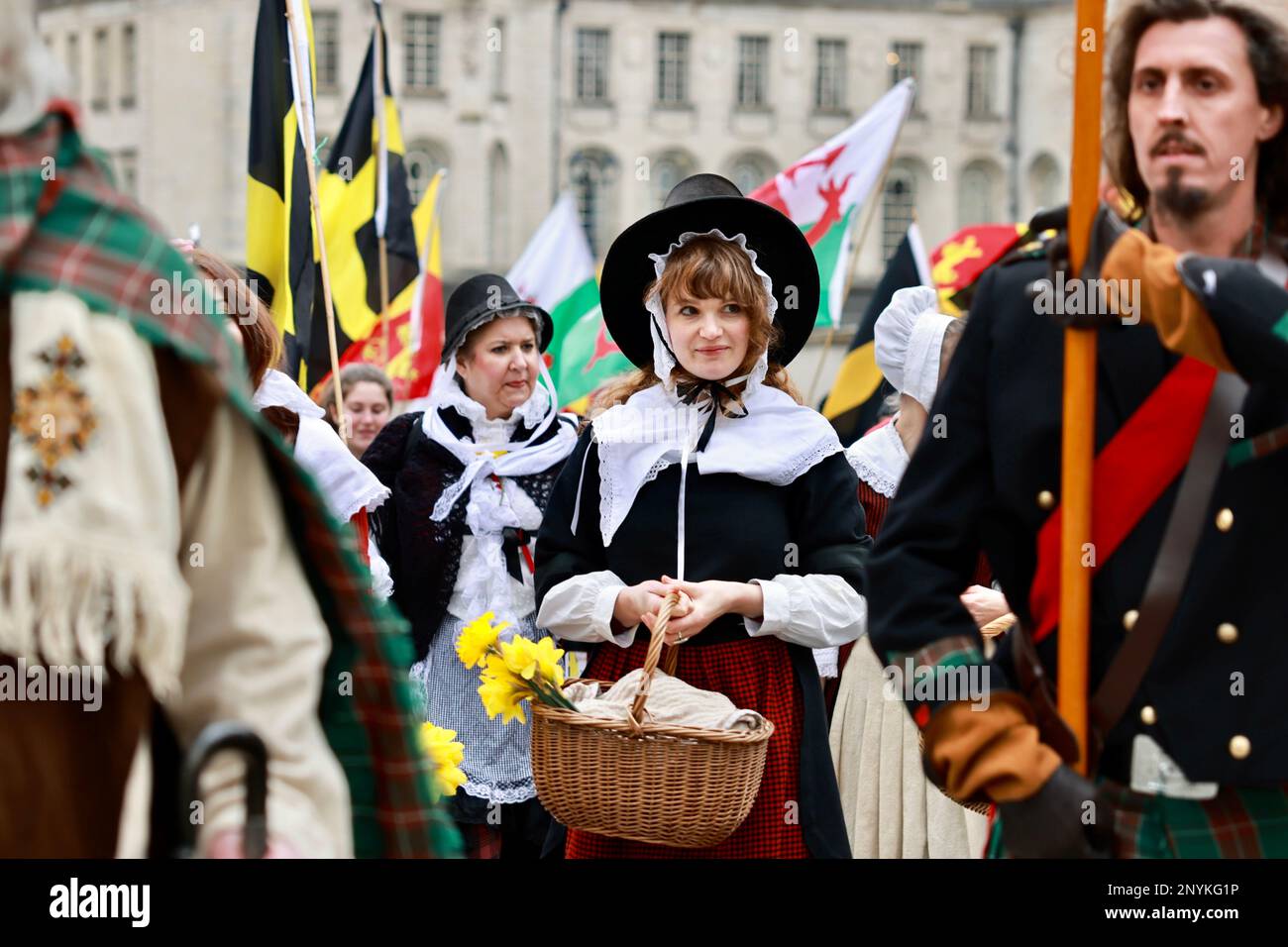 Participants seen dressed in traditional Welsh clothing with daffodil ...
