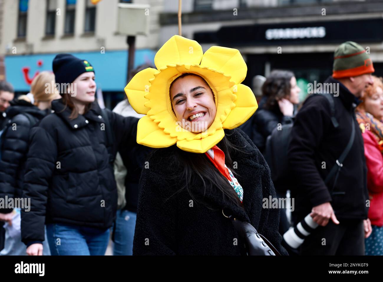 A parade participant seen wearing daffodil decorations during St David ...