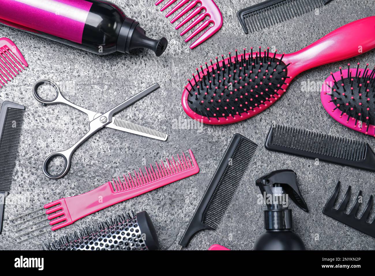 Flat lay composition of professional scissors and other hairdresser's ...