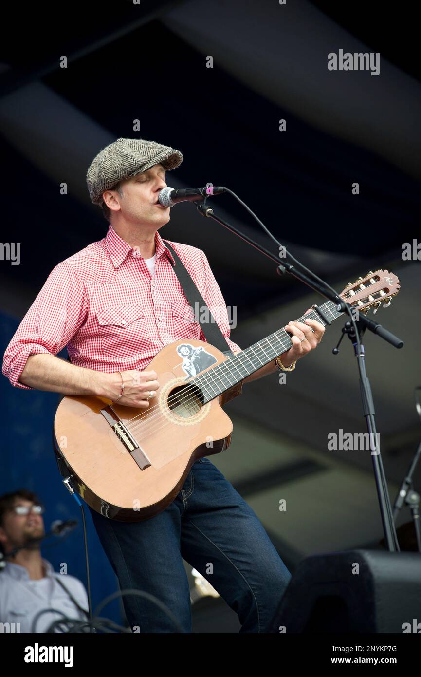 Joey Burns of Calexico performs during the New Orleans Jazz & Heritage ...