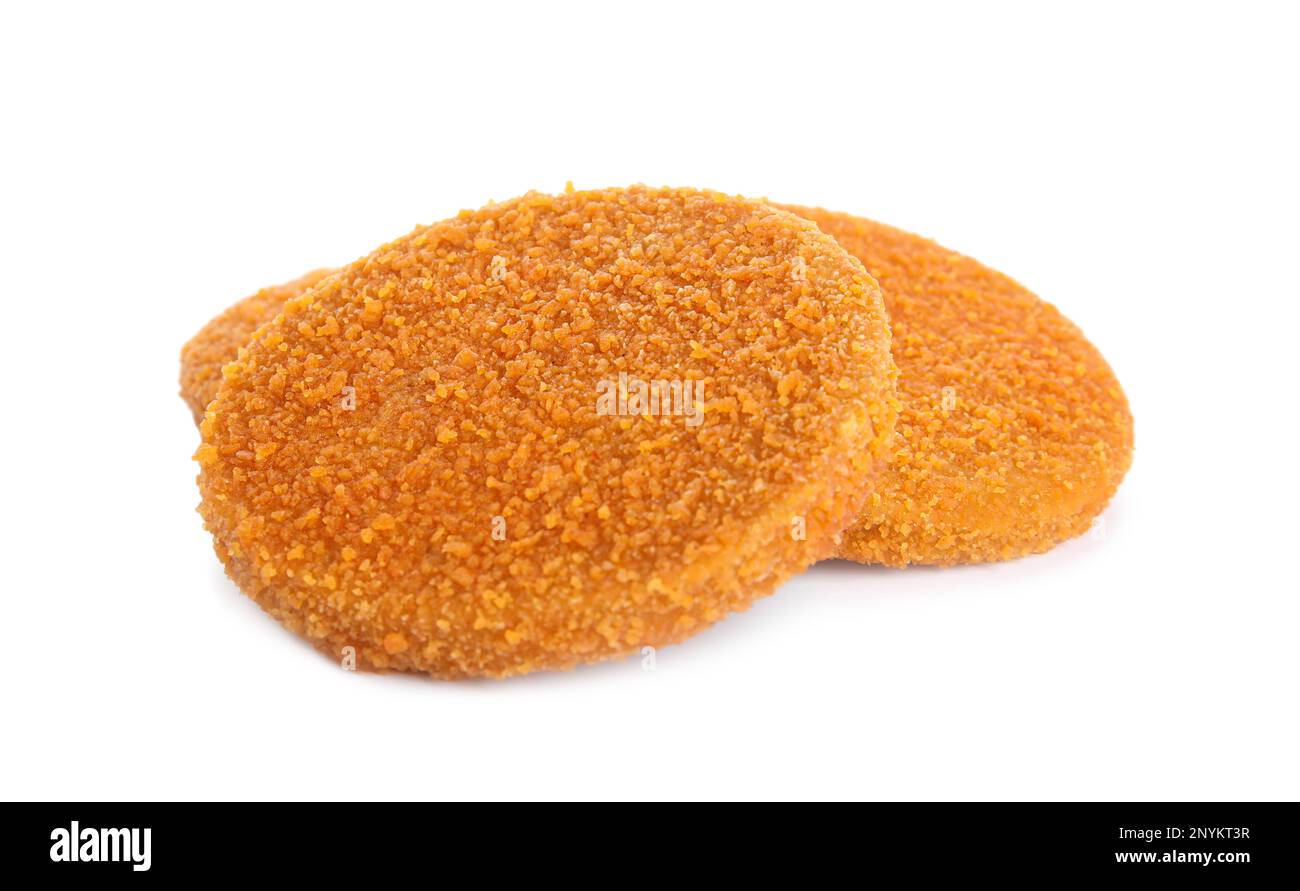 Delicious fried breaded cutlets on white background Stock Photo - Alamy
