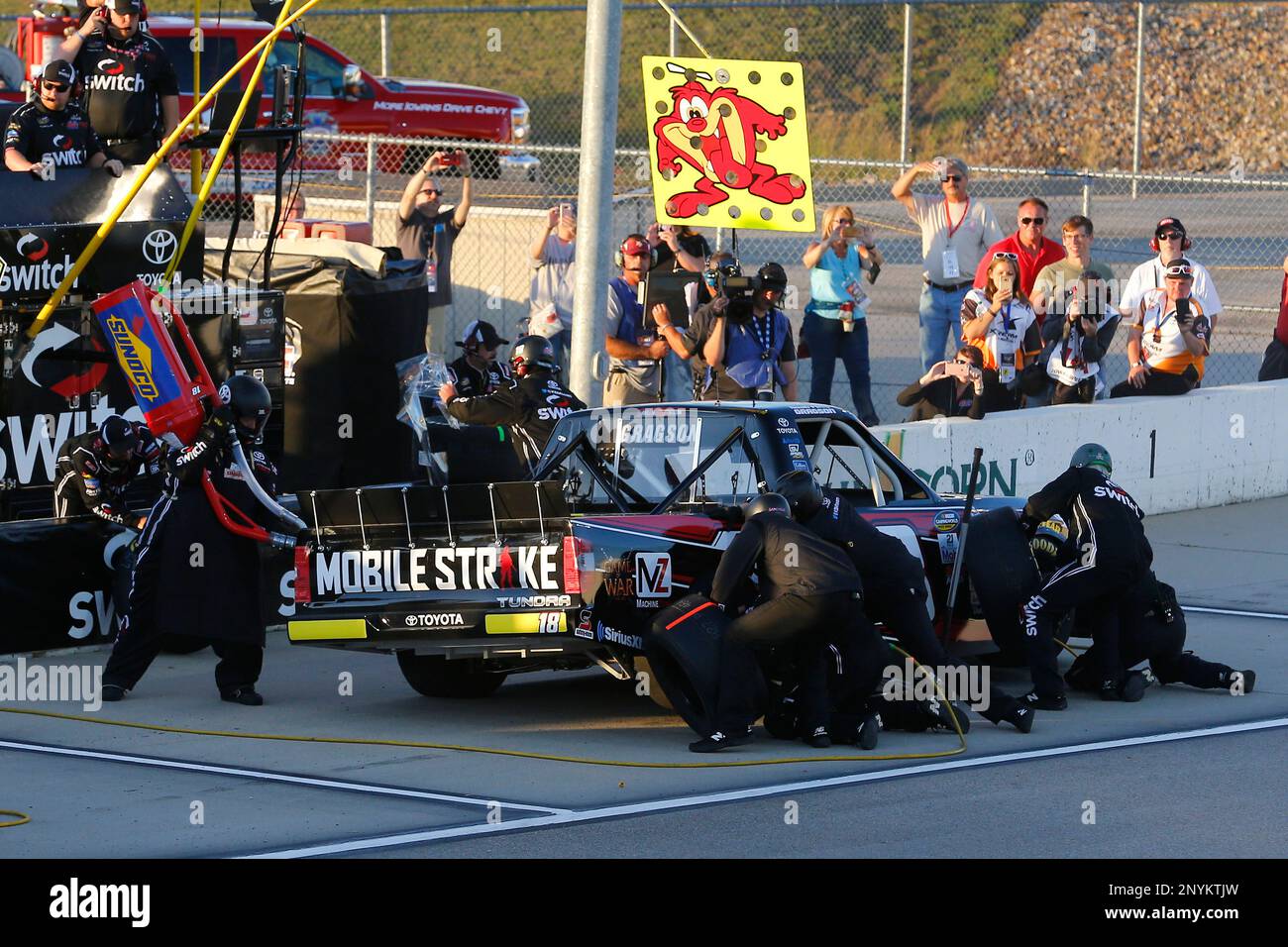 Noah Gragson, Switch Toyota Tundra makes a pit stop during the NASCAR ...