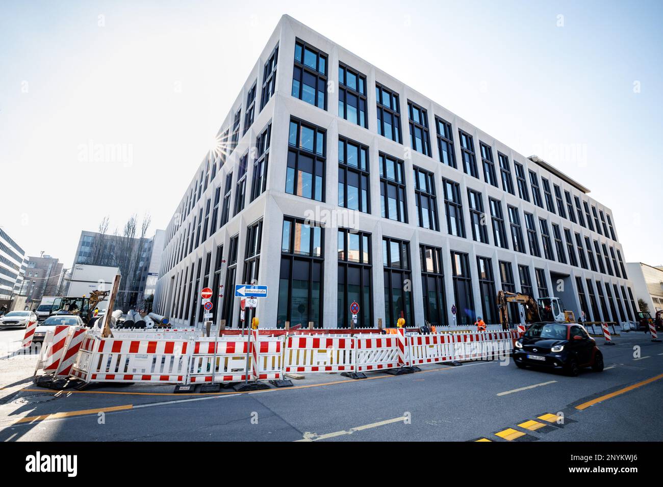 Munich, Germany. 02nd Mar, 2023. A car drives past the construction ...