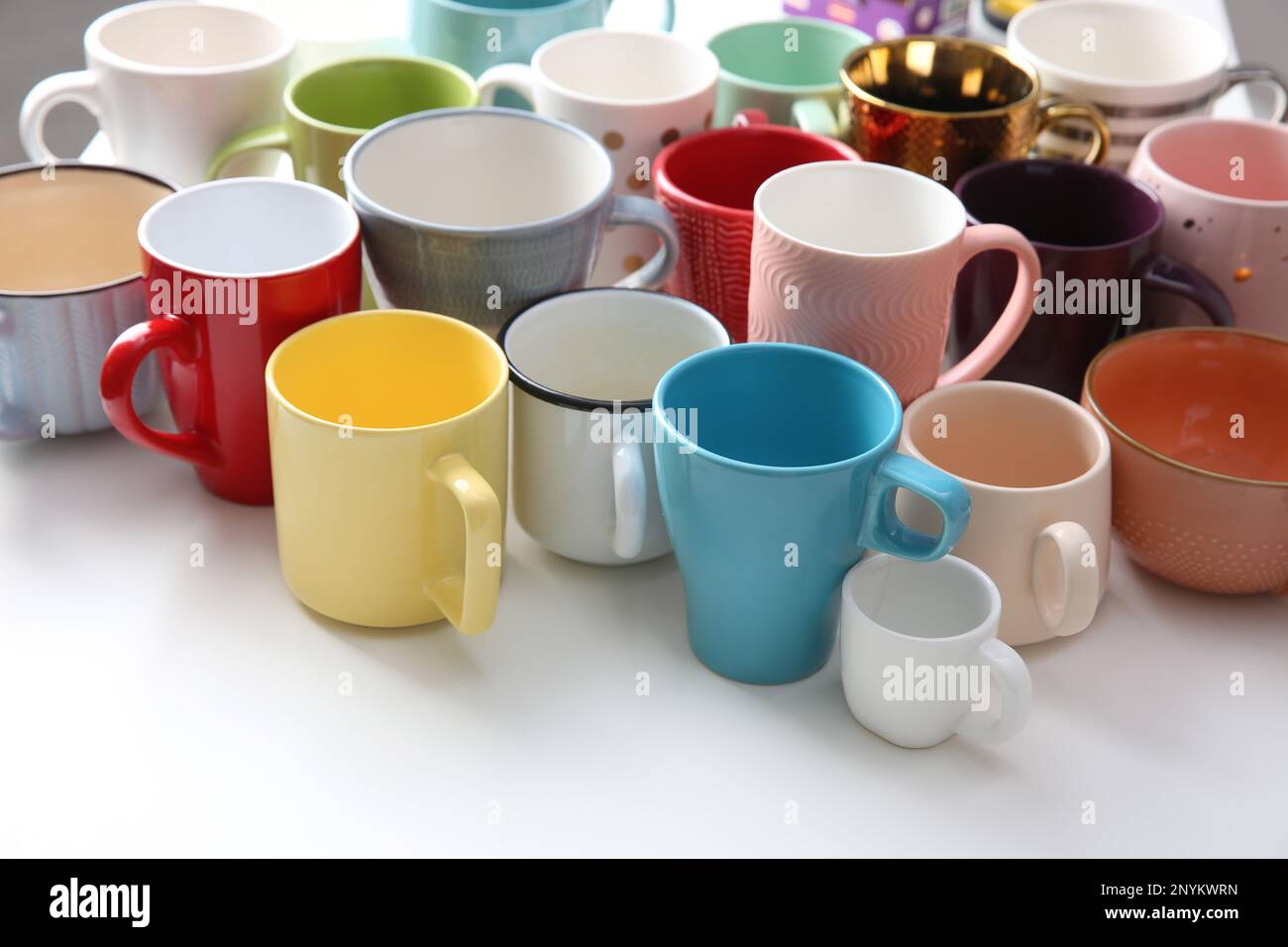 Many different cups on white background. Diversity concept Stock Photo ...