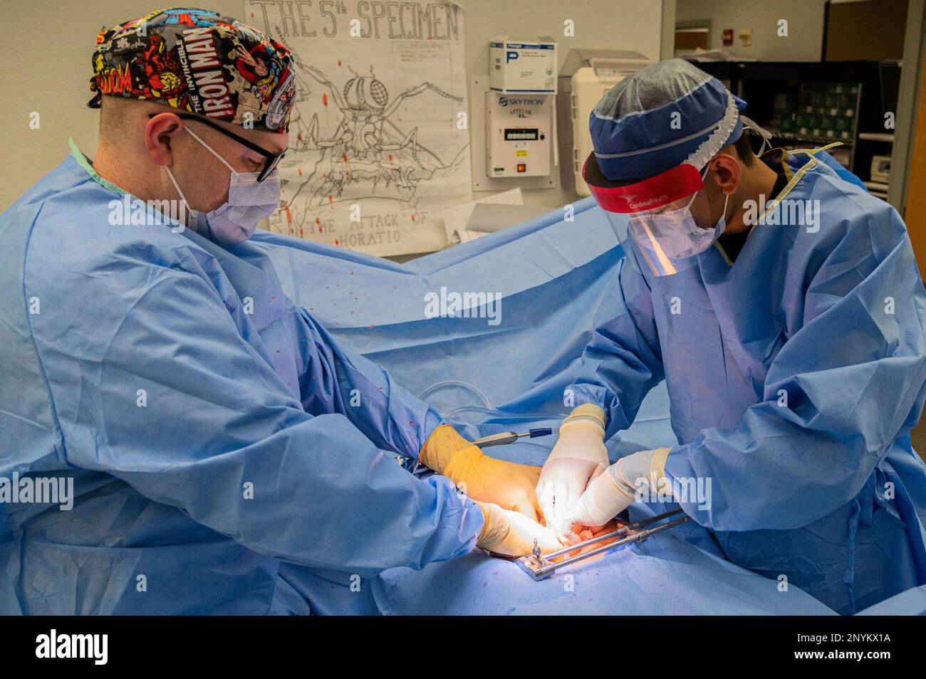 Instructors act as surgeons during a mock surgery while 68D operating ...