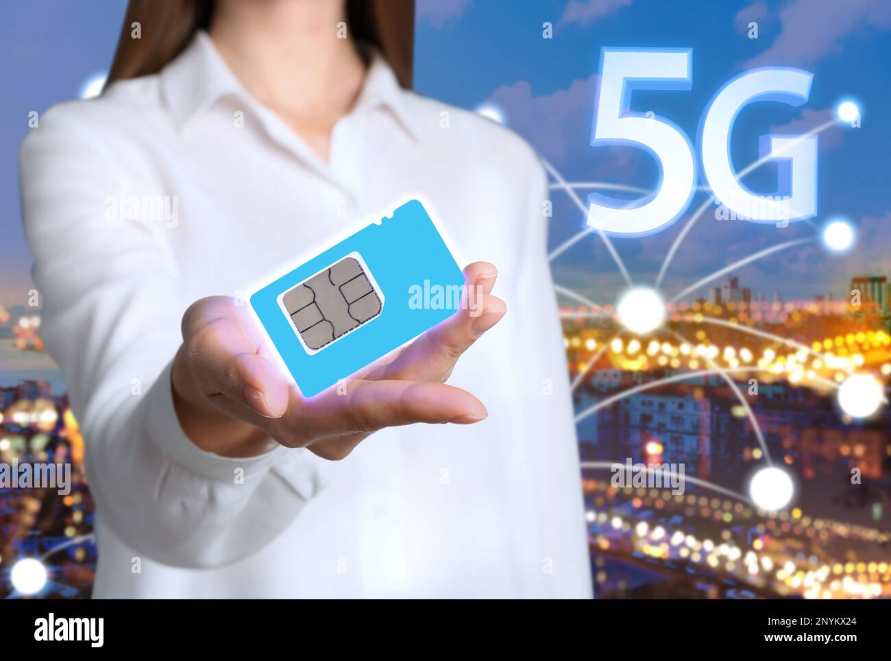 Woman demonstrating 5G SIM card model and cityscape with connection ...