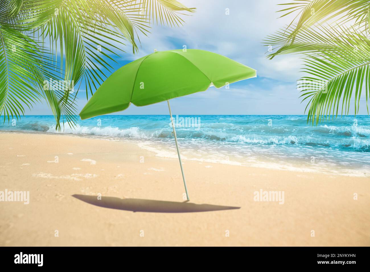 Open big beach umbrella on sandy coast Stock Photo - Alamy