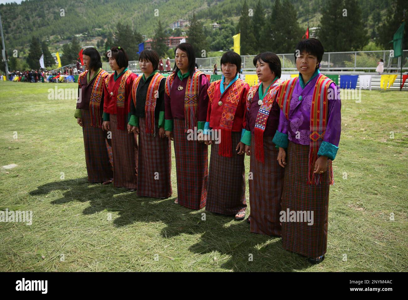 Women wearing Kira, traditional indigenous garbs of Bhutan are seen in ...