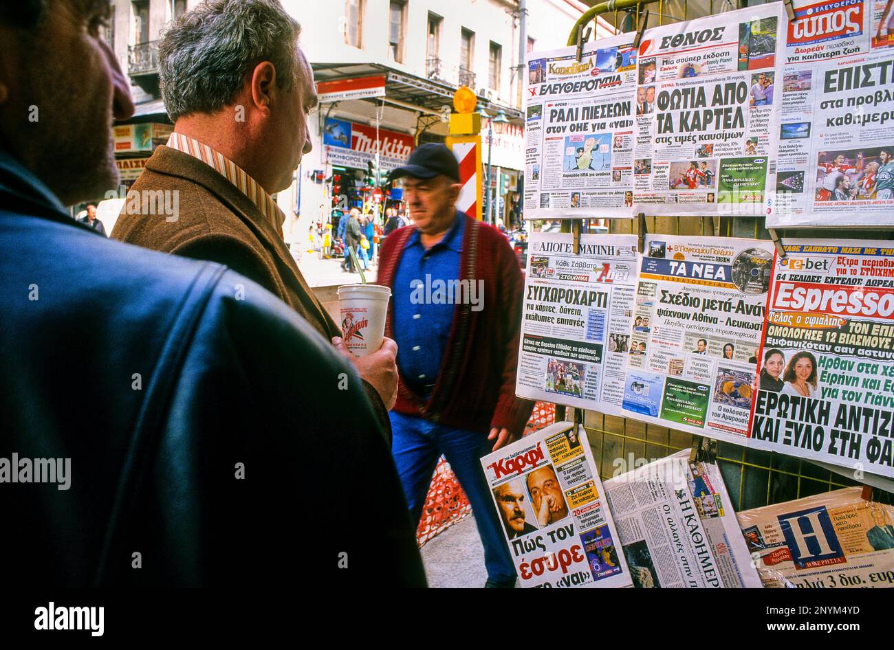 Reading newspaper athens greece hi-res stock photography and images - Alamy